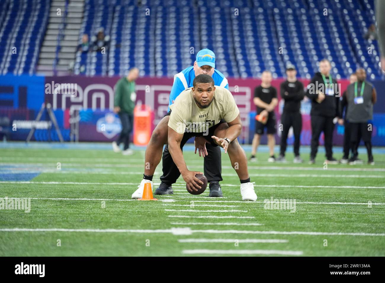 Duke offensive lineman Jacob Monk runs a drill at the NFL football scouting combine, Sunday ...