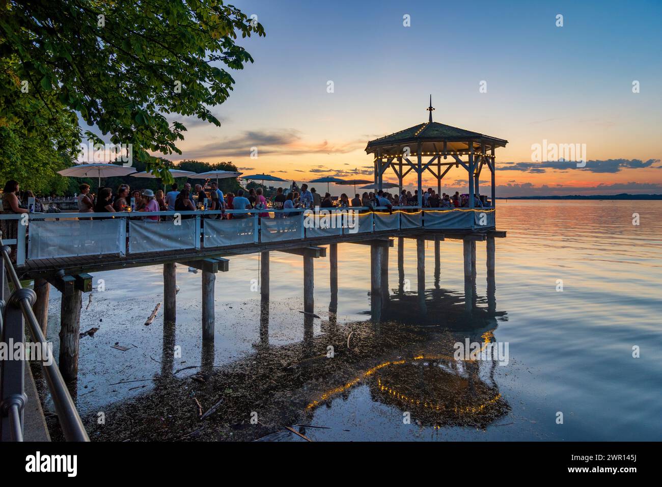 Bregenz: lake Bodensee (Lake Constance), bridge Fischersteg with bar ...