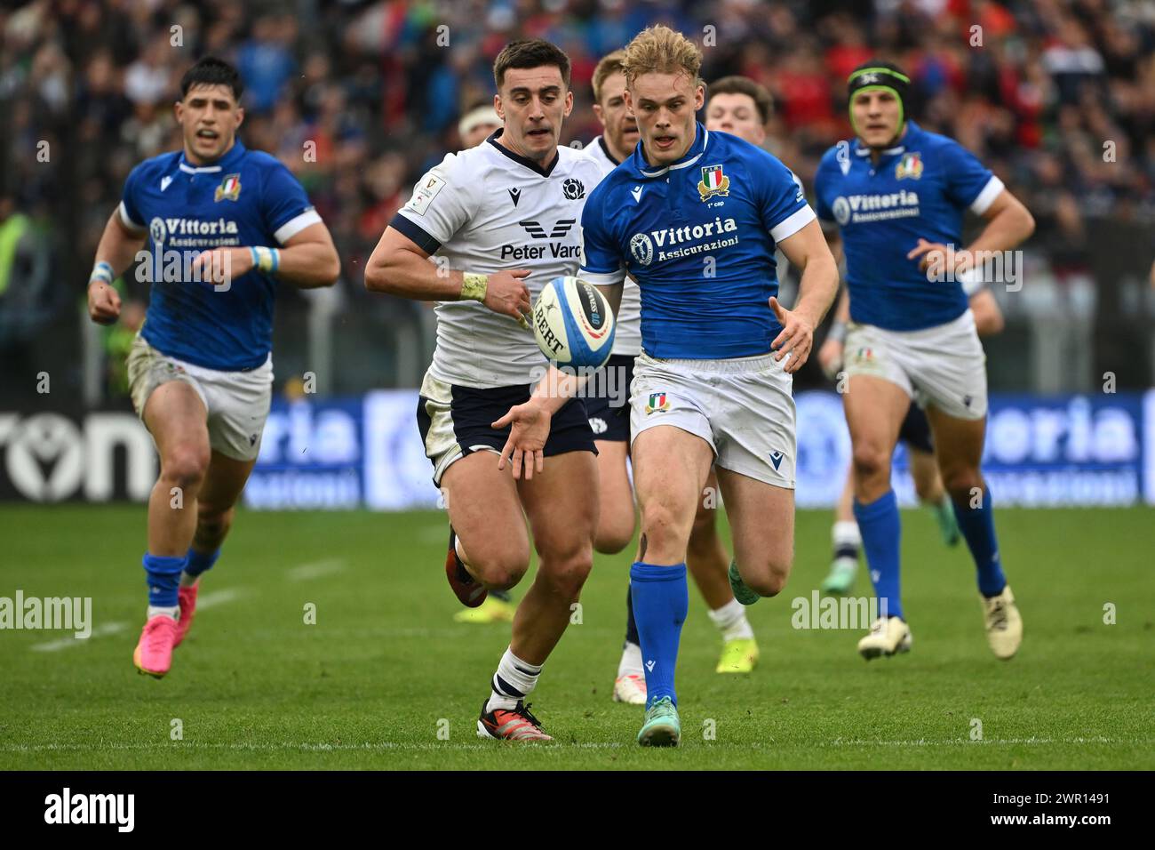 Cameron Redpath of Scotland and Louis Lynagh of Italy during the Six ...