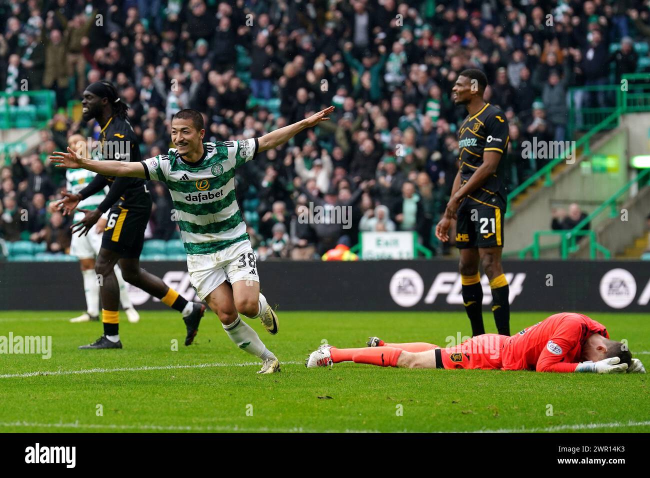 Celtic’s Daizen Maeda (right) celebrates scoring their side's second ...