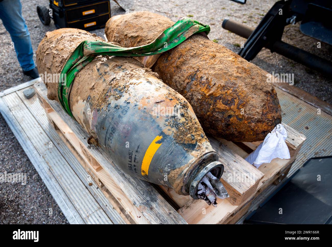 Kiel, Germany. 10th Mar, 2024. Two defused aerial bombs lie in an ...