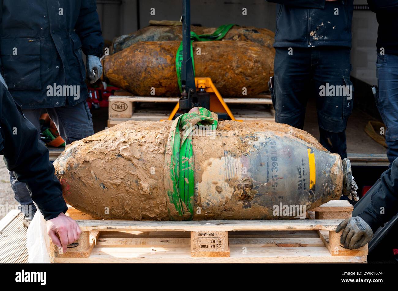 Kiel, Germany. 10th Mar, 2024. Four defused aerial bombs lie in an ...