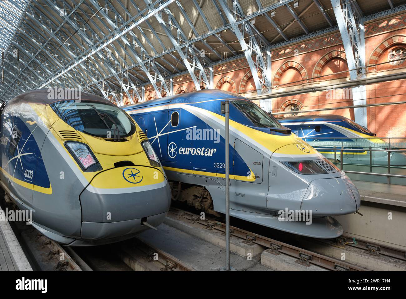 Three Eurostar trains in the station at Saint Pancras International ...