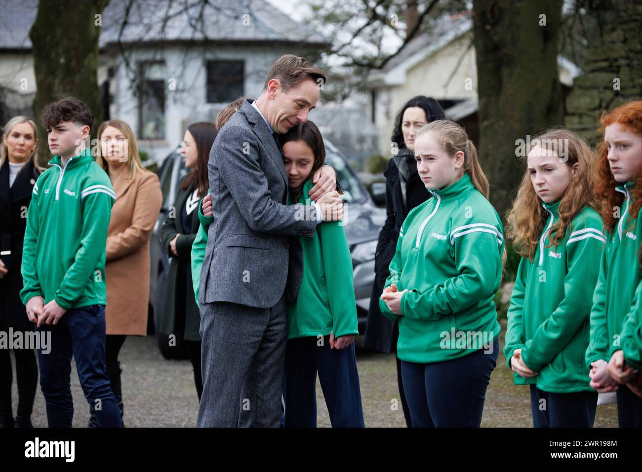 Ryan Tubridy comforting classmates of 12-year-old Saoirse Ruane during ...