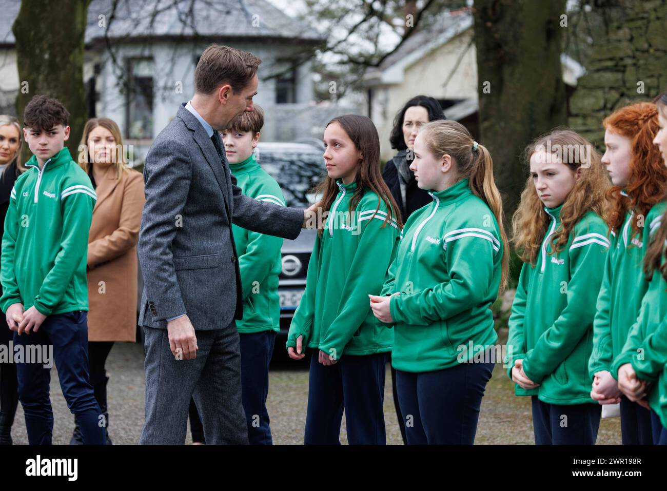Ryan Tubridy comforting classmates of 12-year-old Saoirse Ruane during ...