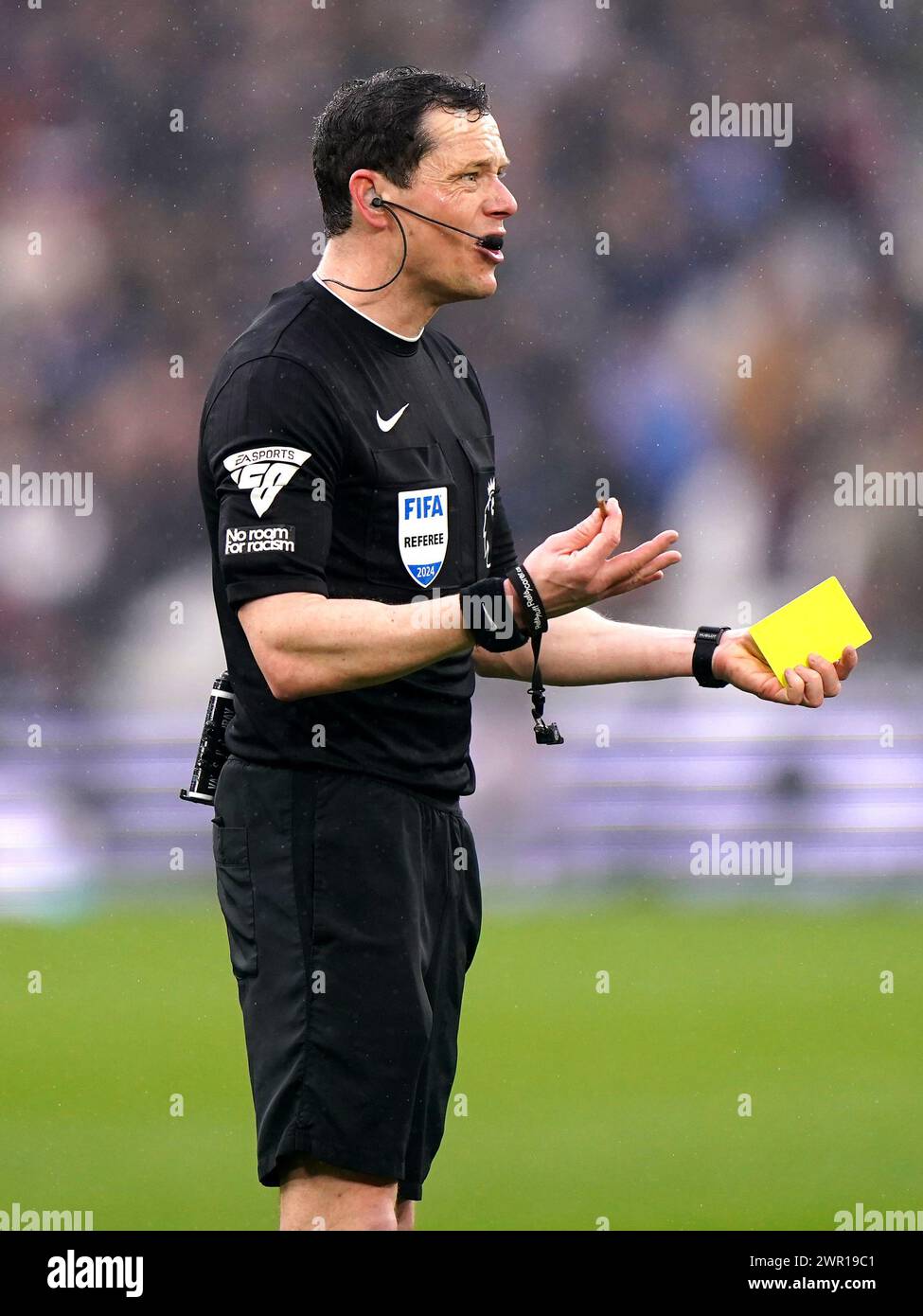 Referee Darren England during the Premier League match at the London ...
