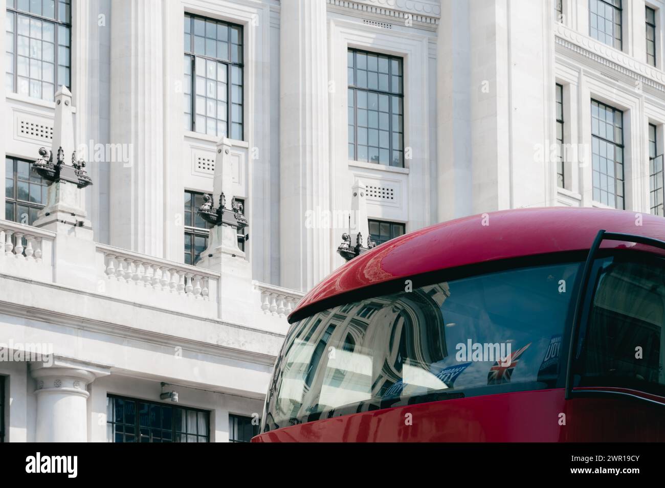 Top of British Red Double Decker Bus with reflection of Union Jack flag ...