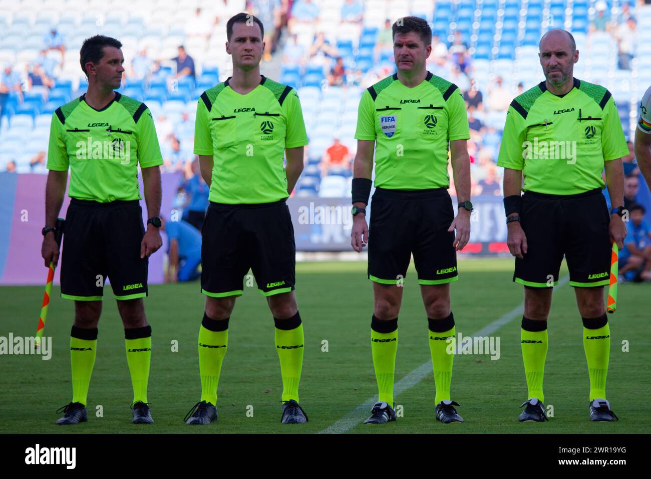 Sydney, Australia. 10th Mar, 2024. Match referees line up on the pitch ...