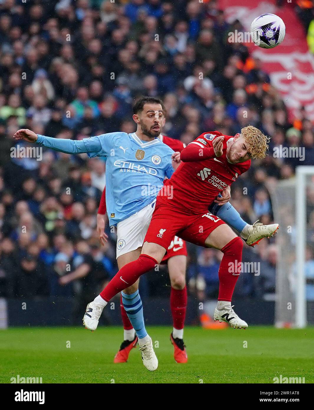 Manchester City's Bernardo Silva (left) and Liverpool's Harvey Elliott ...