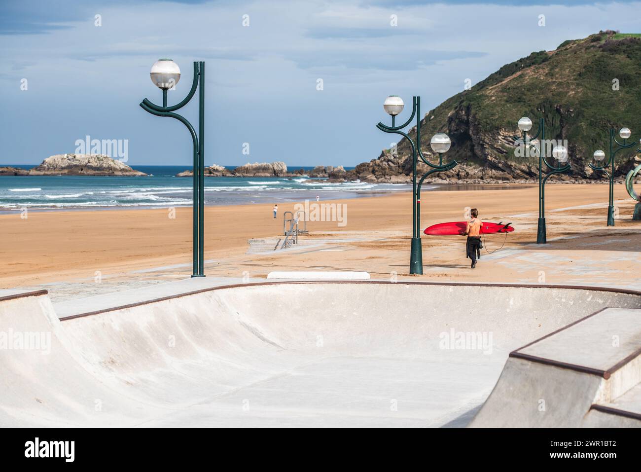 Concrete skatepark and surfist, Oceanside in Zarauts, Pais Vasco, Spain ...