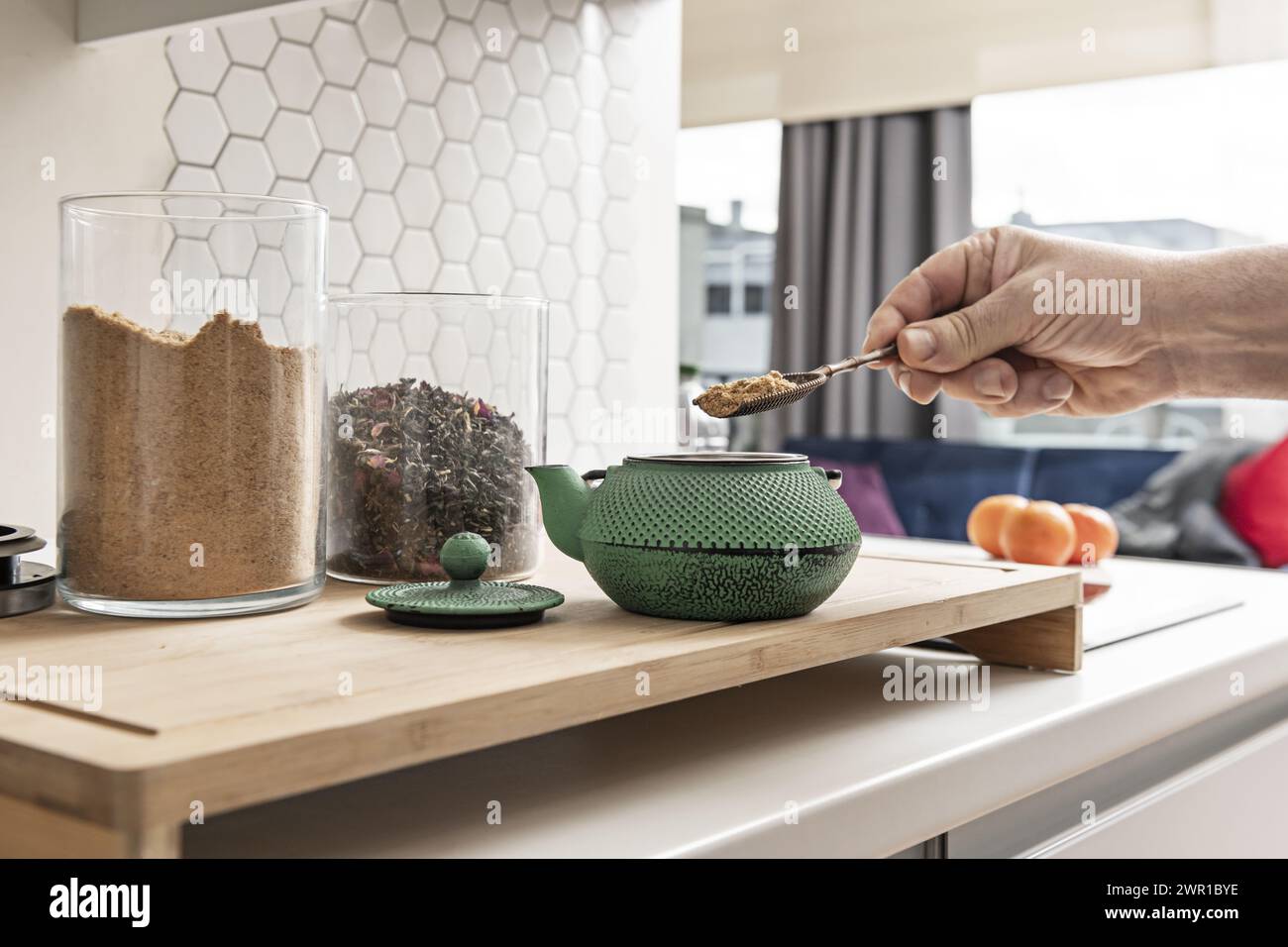 Tea has properties of both solution and suspension. It is a solution of ...