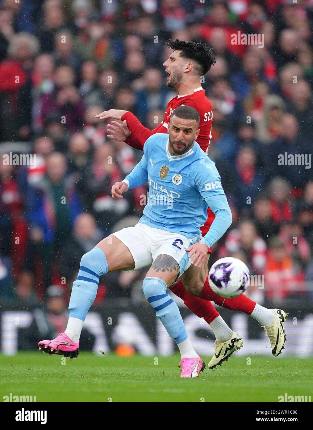 Manchester City's Kyle Walker (left) fouls Liverpool's Dominik ...