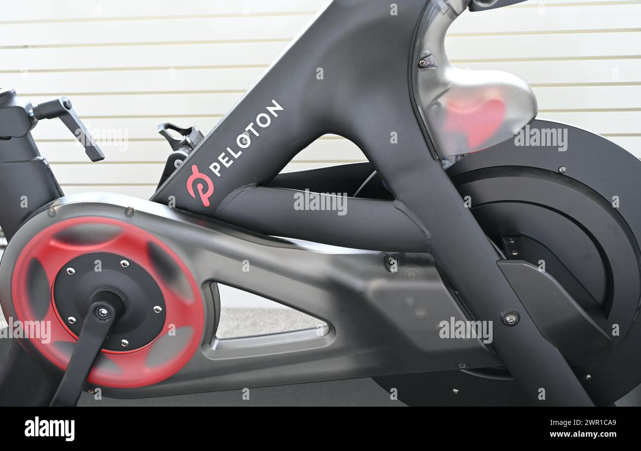 Peloton bike close up with name and logo Stock Photo - Alamy