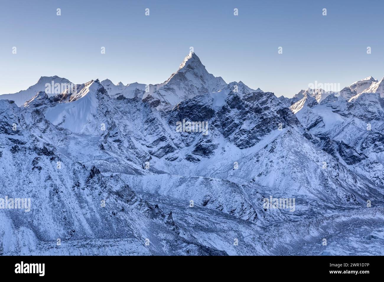 Ama Dablam mountain landscape. Sharp mountain peak standing out among ...