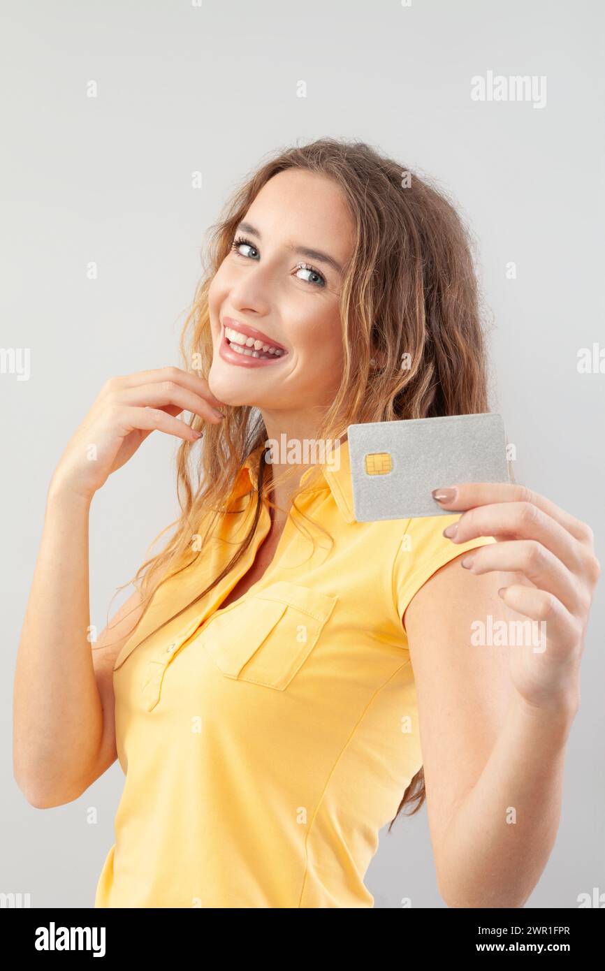 Portrait of laughing girlish woman with long hair do wear yellow top ...