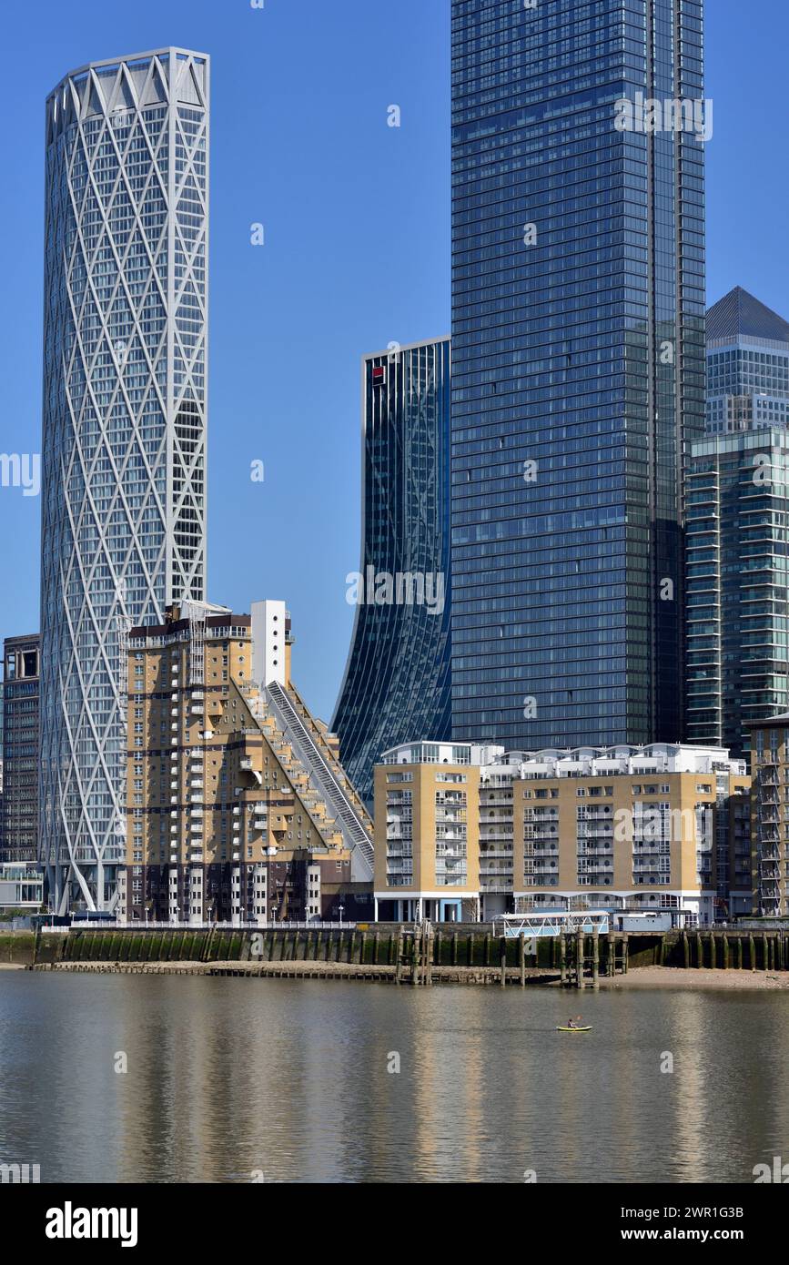 Canoe passing the Newfoundland, the Landmark Pinnacle, west india dock ...
