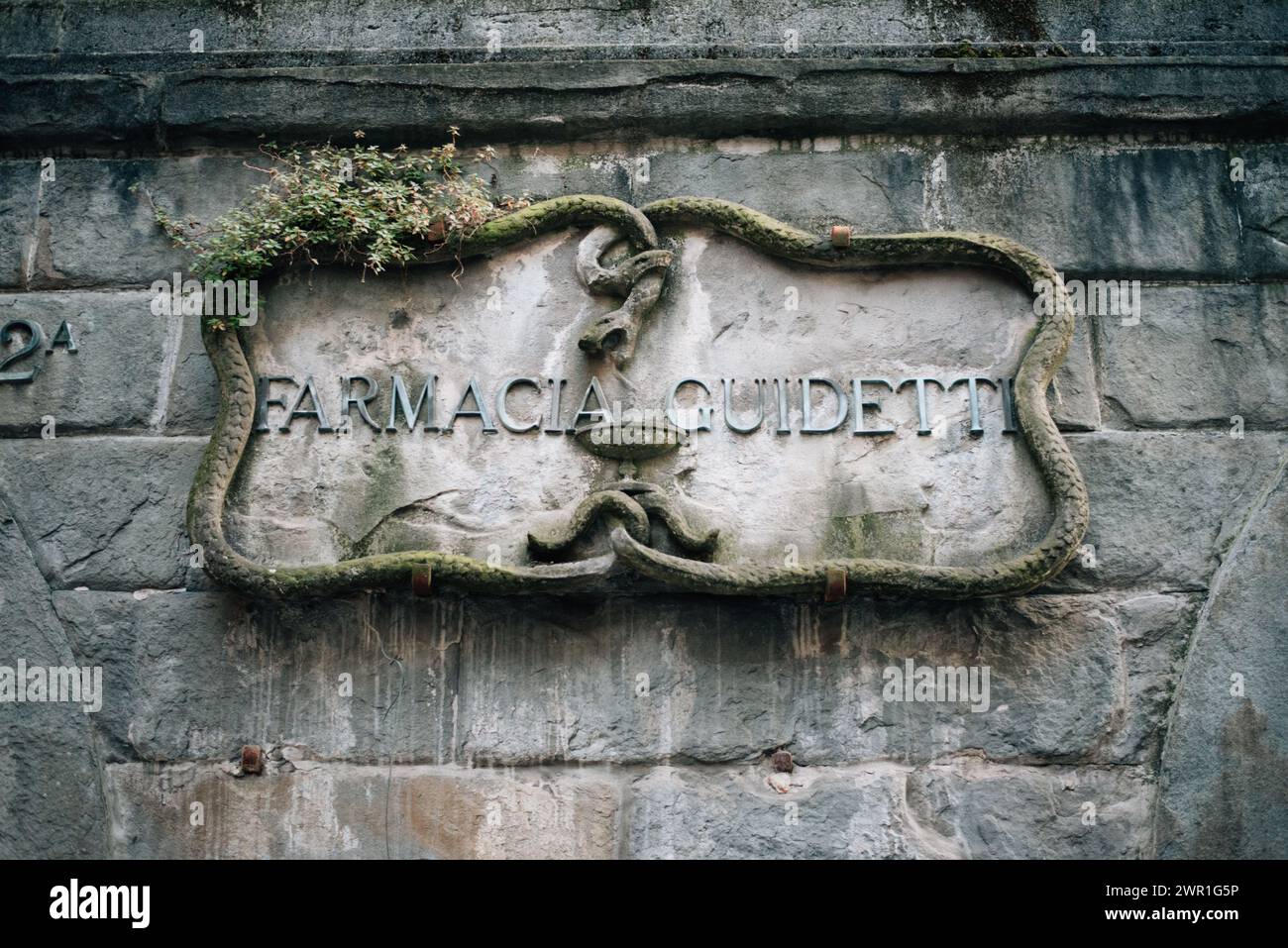 antique sign indicating a pharmacy on a stone house. High quality photo ...