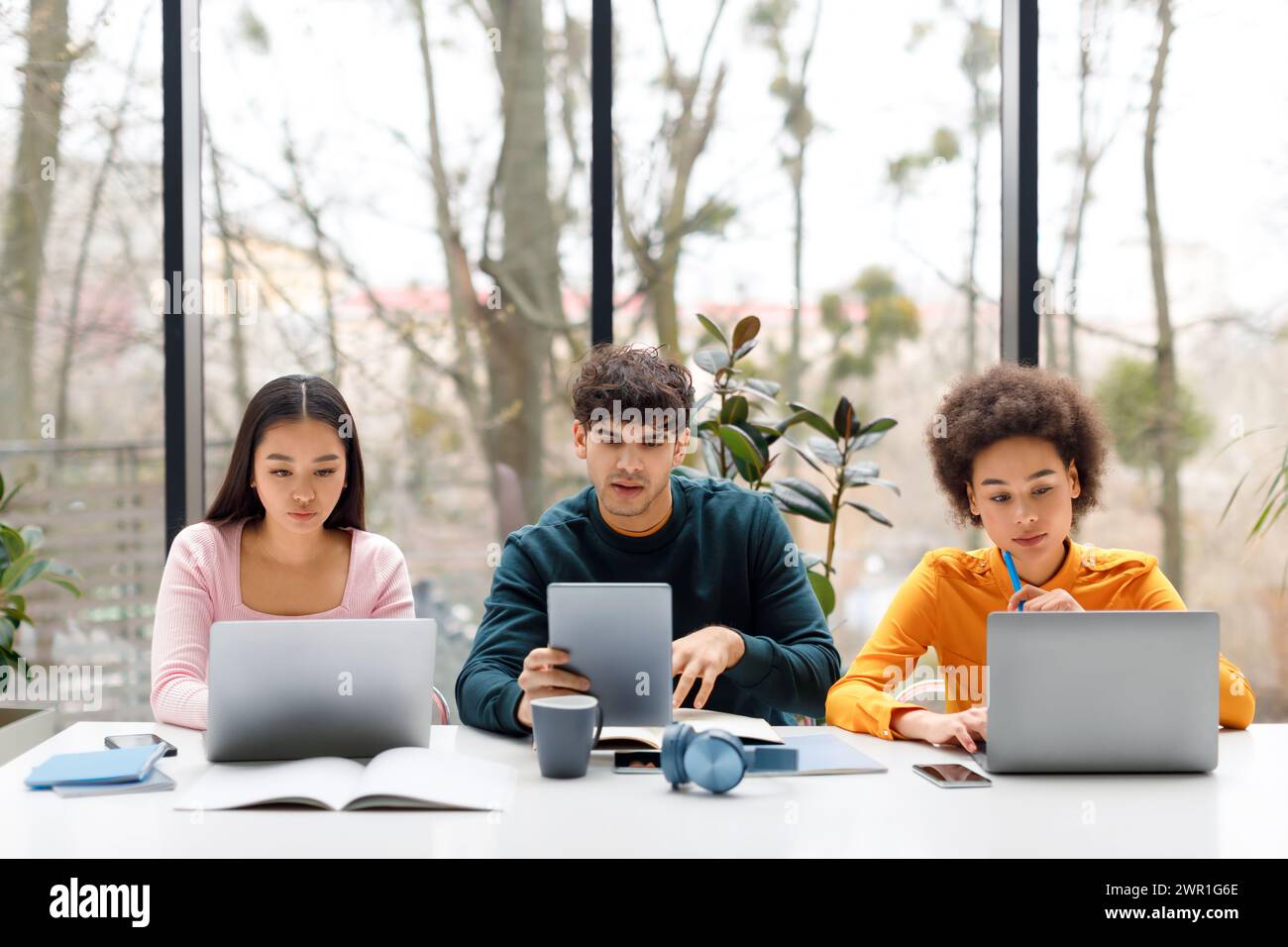 Diverse group college students focused hi-res stock photography and ...