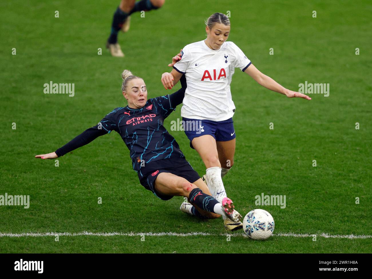 Tottenham Hotspur’s Celin Bizet (right) and Manchester City’s Alex ...