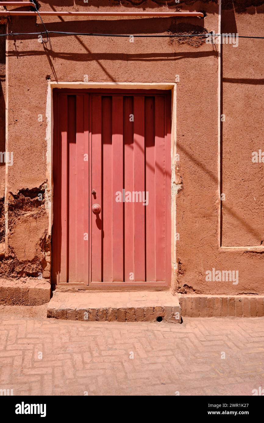 Pink and wooden door in ancient village of Abyaneh in iran, Traditional ...