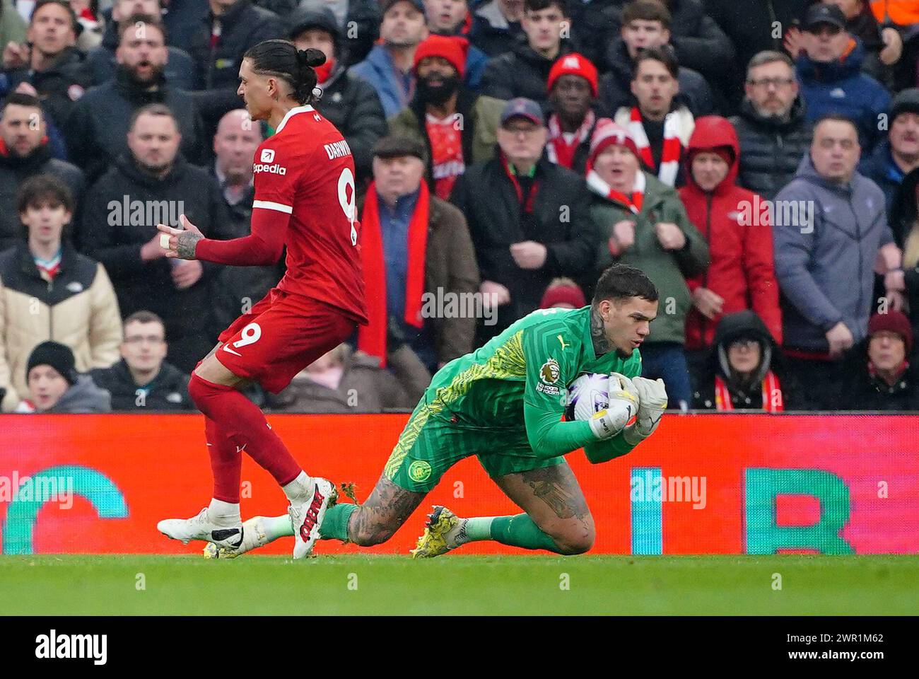 Manchester City goalkeeper Ederson goes to ground before pulling up ...
