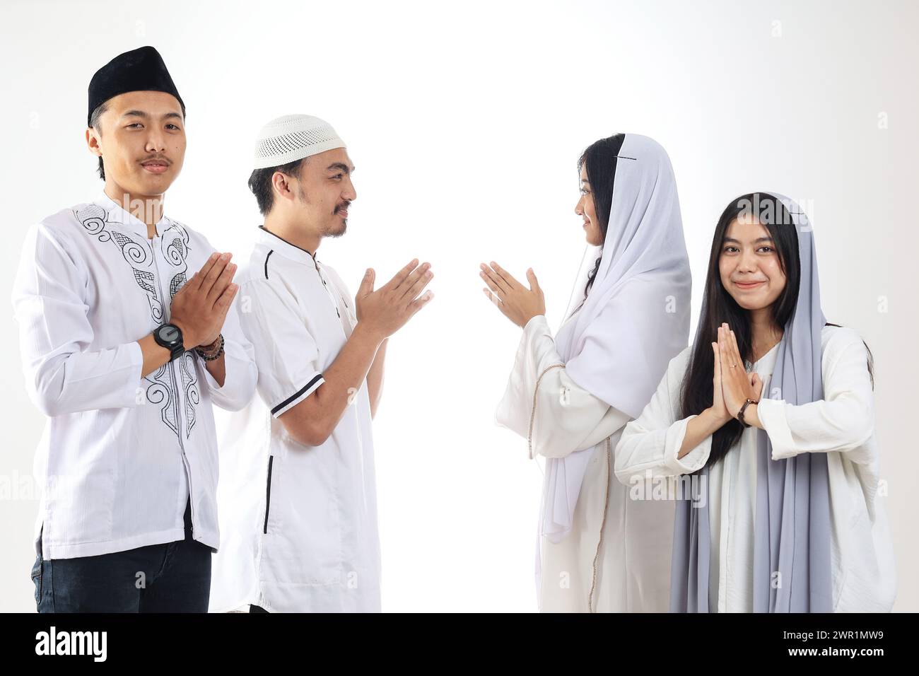 A Group of Asian People Friends Forgiving Each Other during Eid Mubarak ...