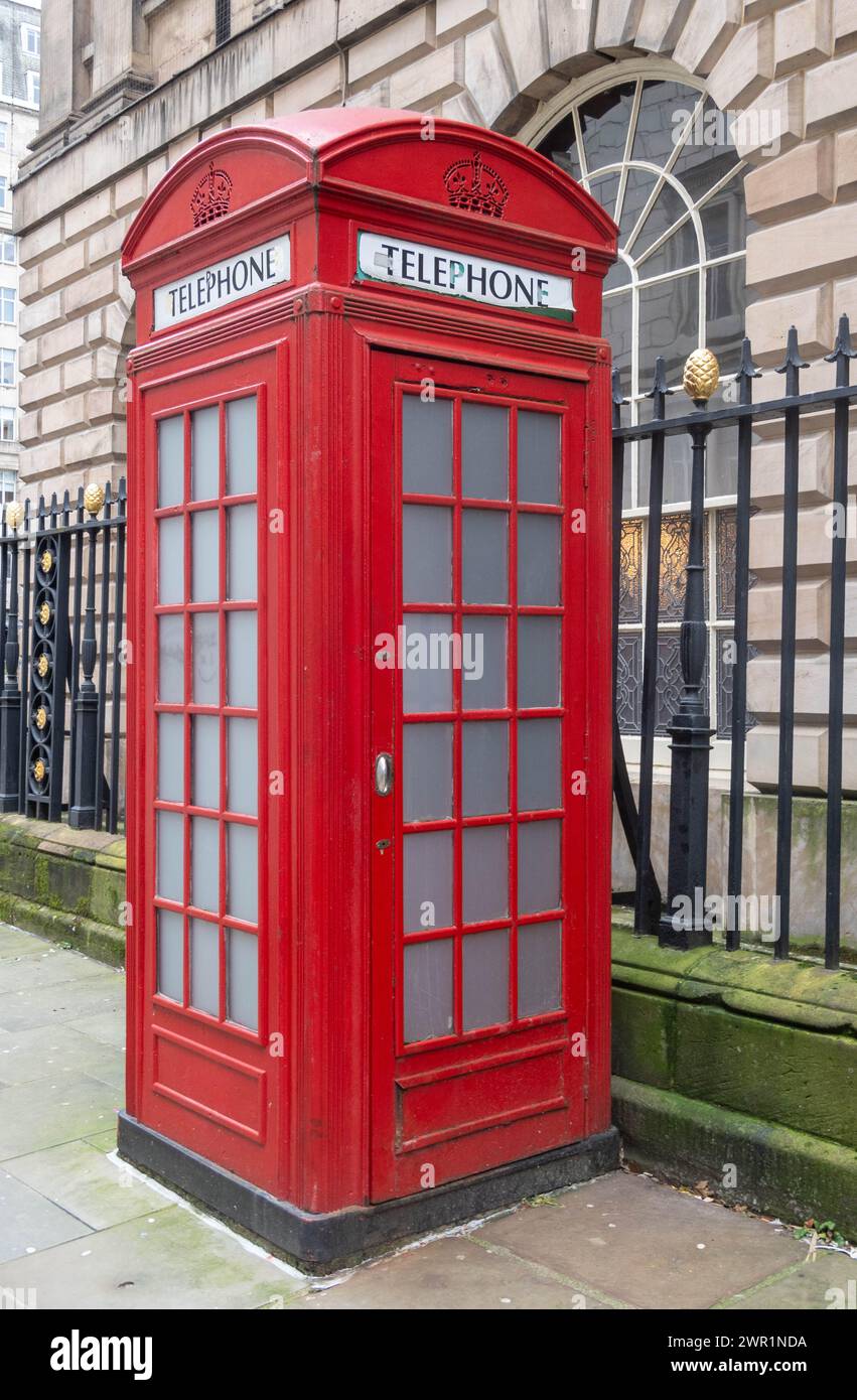 A traditional red telephone box in Liverpool Stock Photo - Alamy
