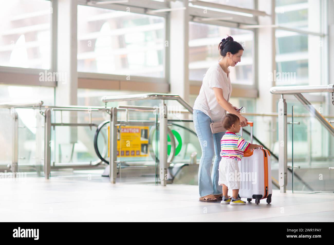 Asian family suitcase in airport hi-res stock photography and images ...