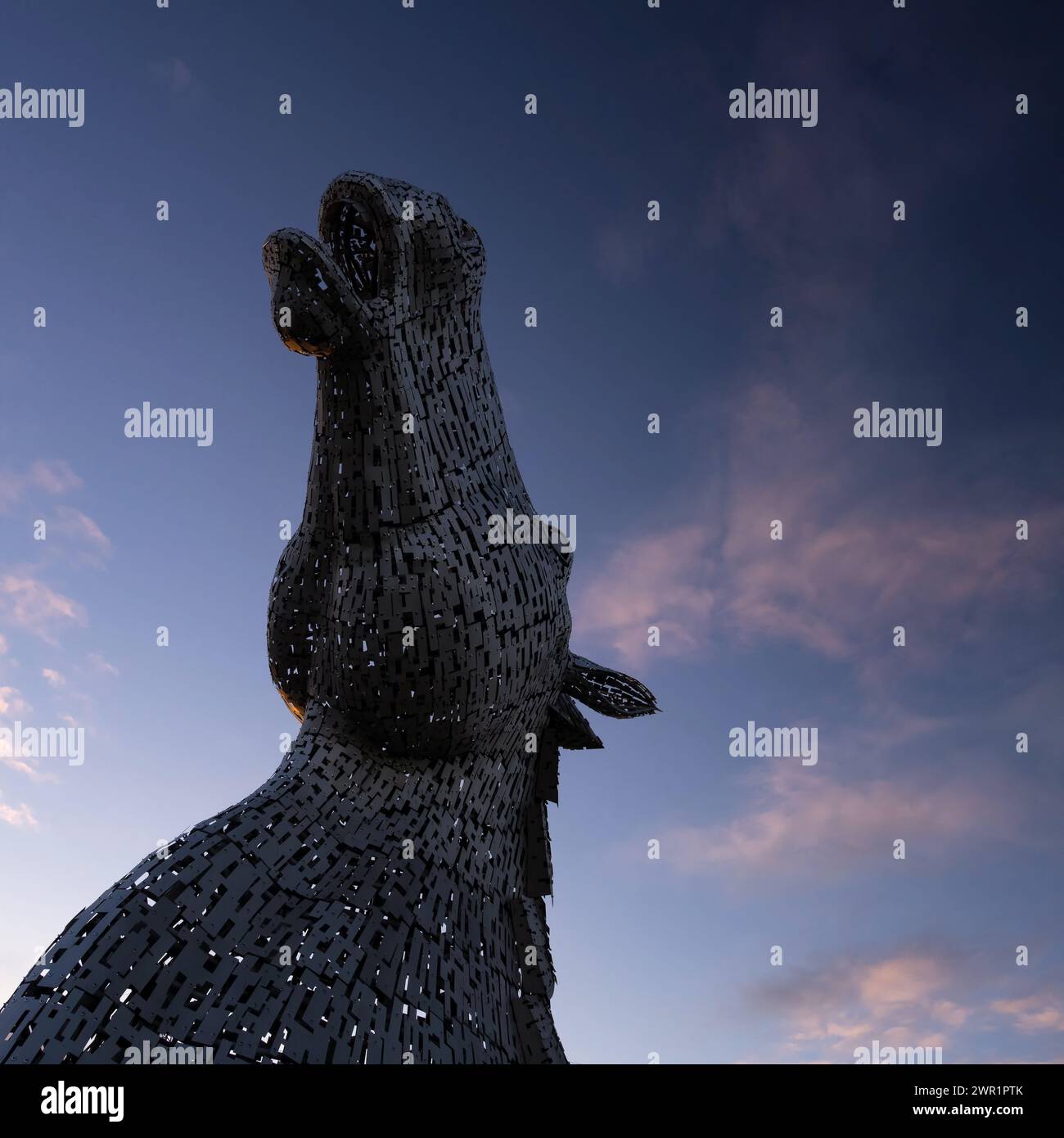 The Kelpies sculpture of face during sunset, Scotland Stock Photo - Alamy