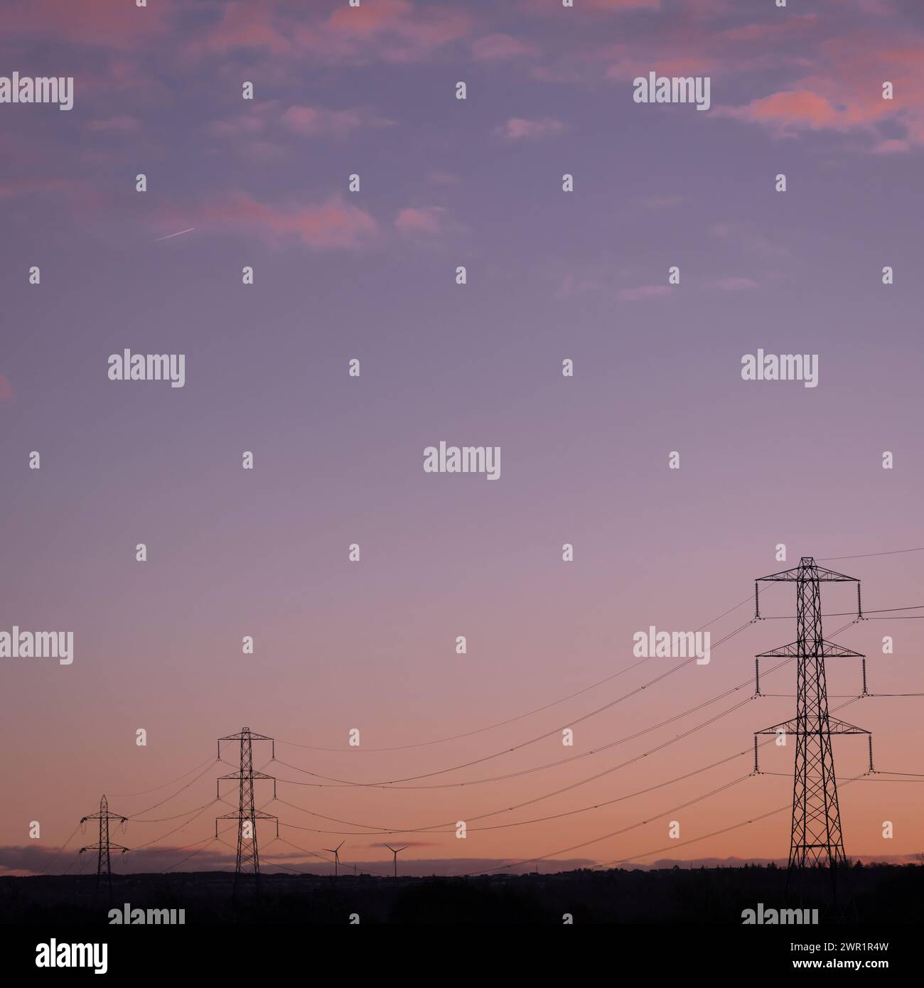 Aerial power lines against the sunset Stock Photo - Alamy