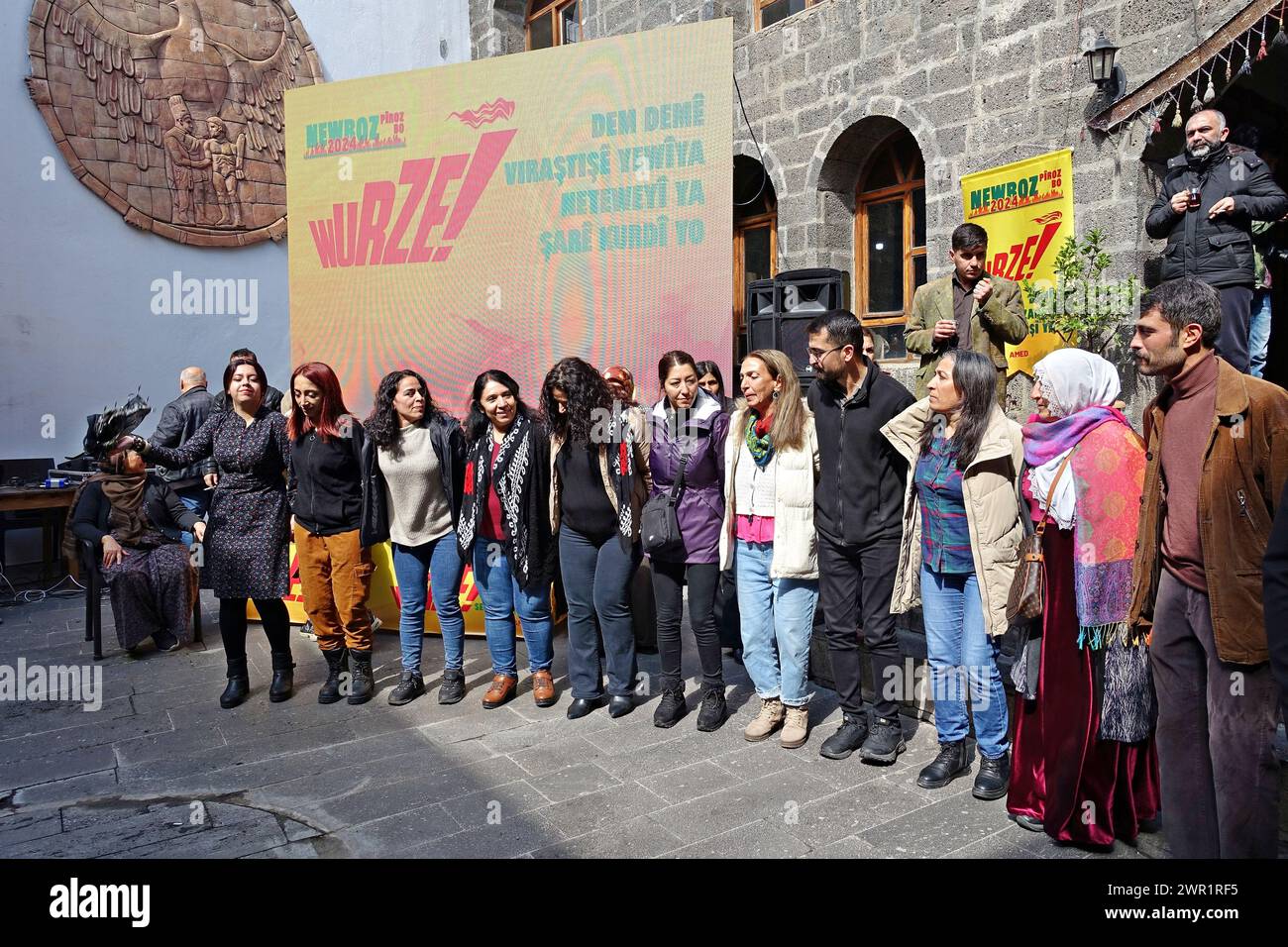 A group of Kurds are seen dancing after the announcement of the ...