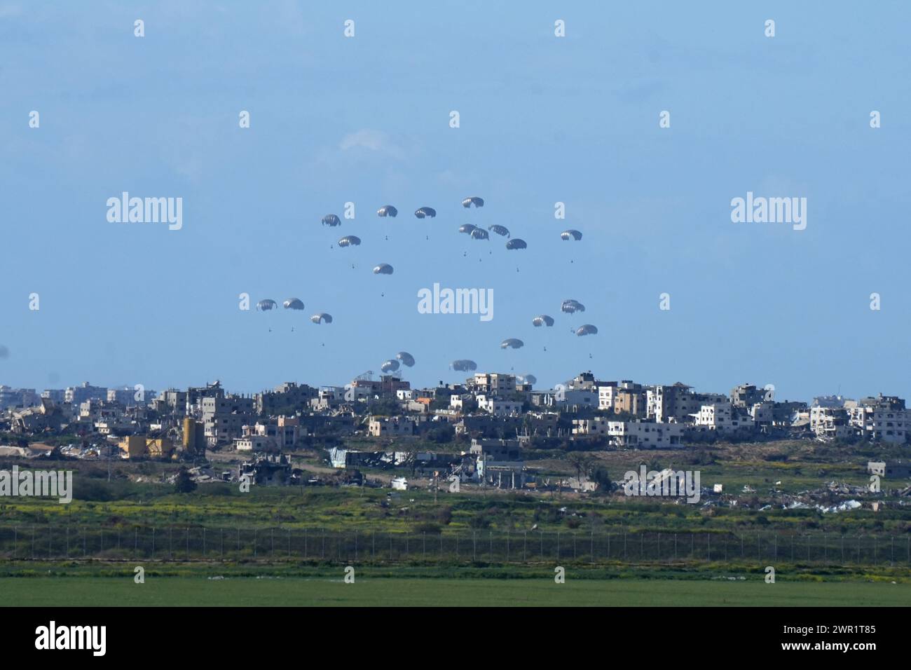 Israeli planes drop humanitarian aid to residents in the northern Gaza ...
