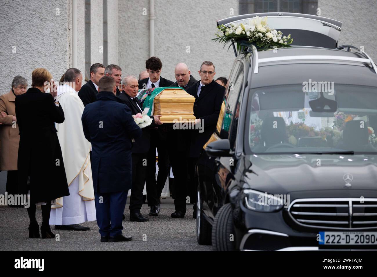 The coffin of 12-year-old Saoirse Ruane is carried out of Saints Peter ...