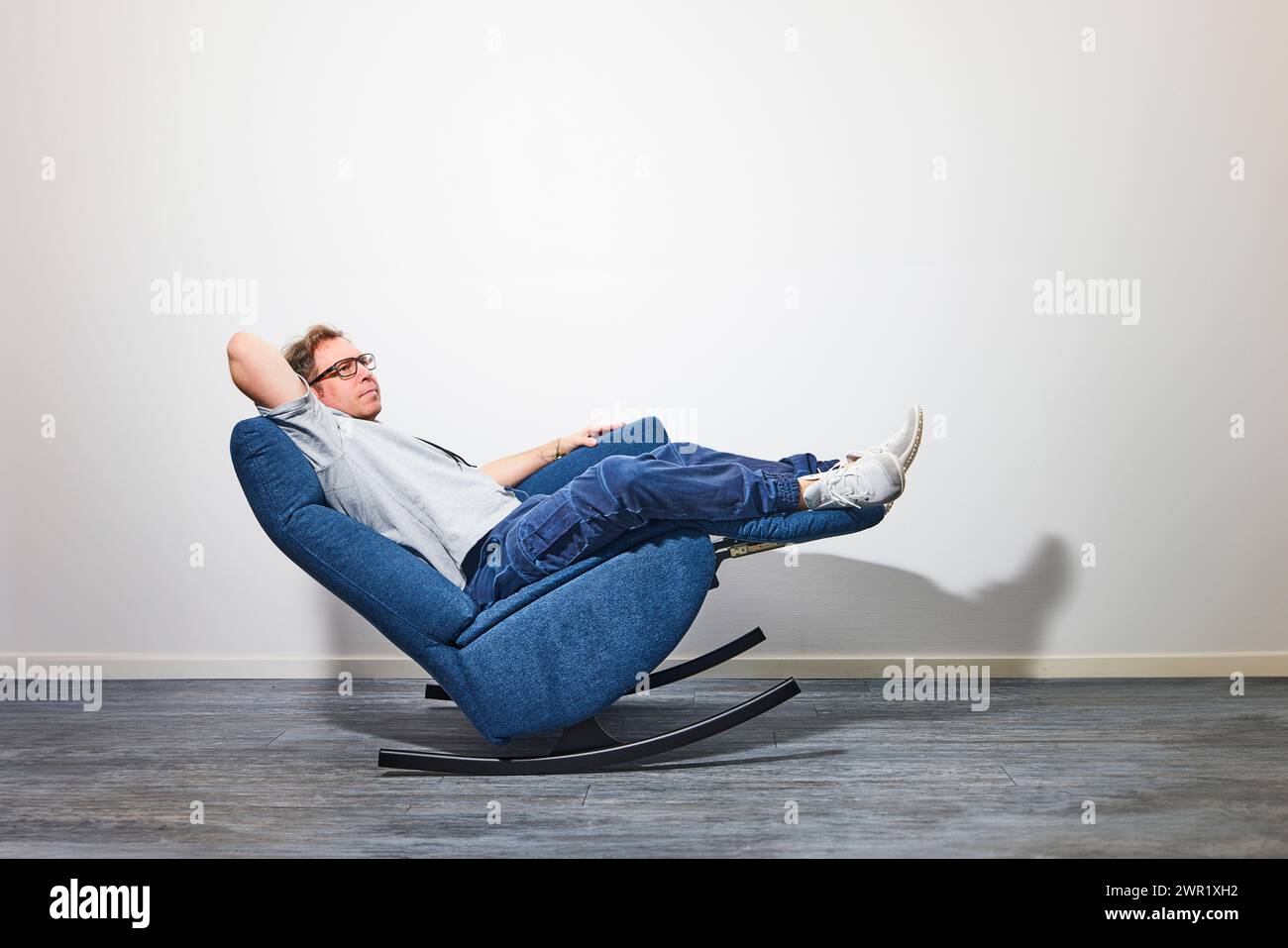 Man relaxing head back in chair hi-res stock photography and images - Alamy