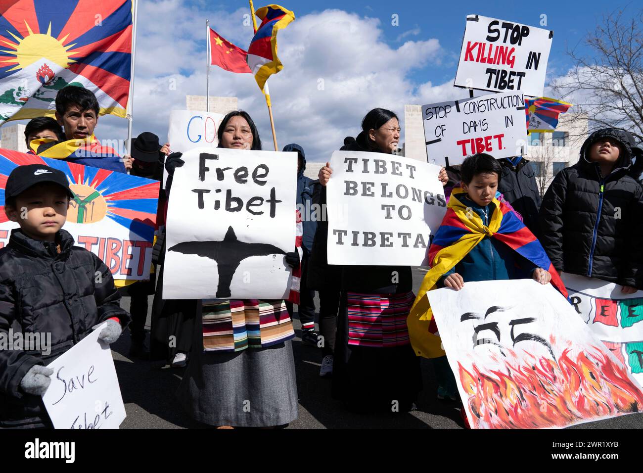 Tibet supporters protest outside China's embassy to commemorate the ...