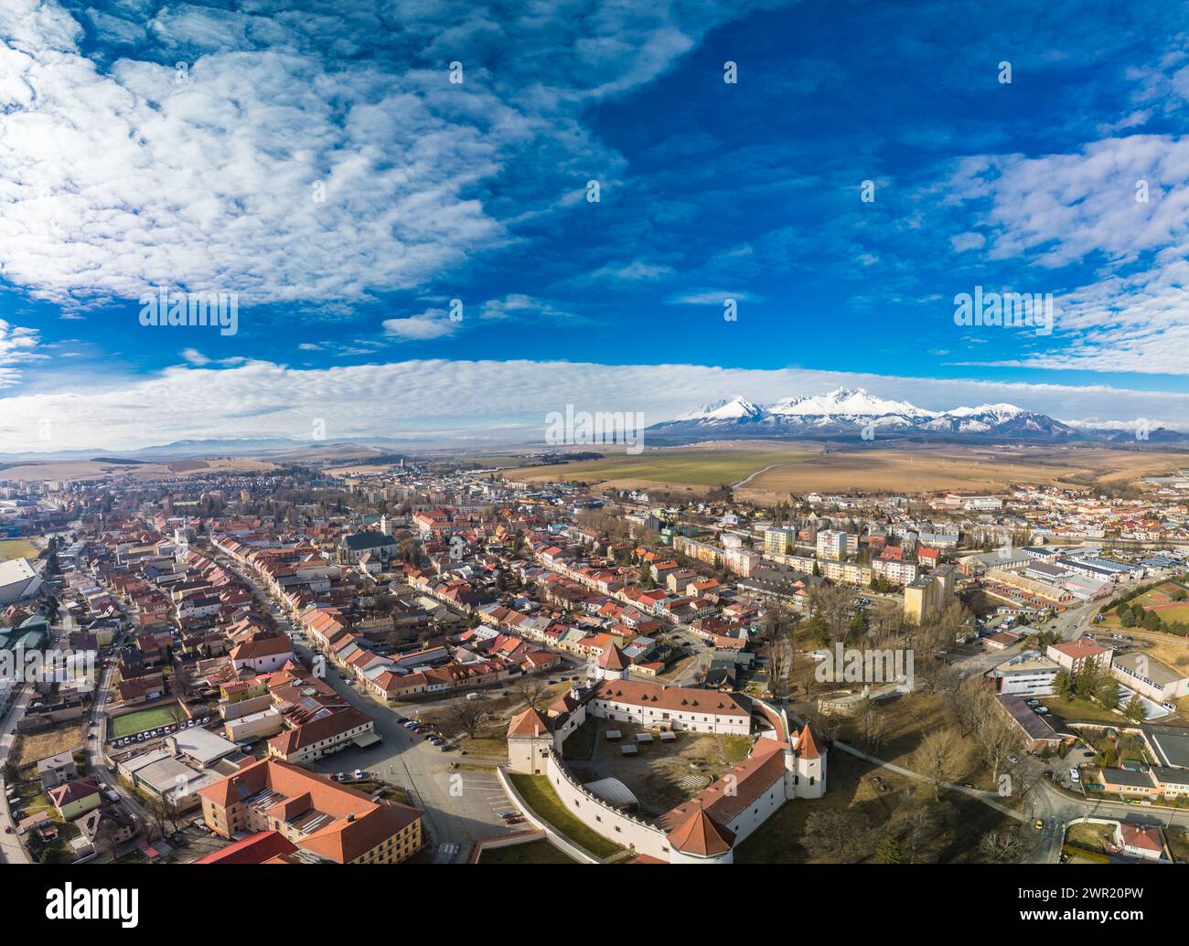 The town of Kezmarok with views of High Tatras, Slovakia Stock Photo ...