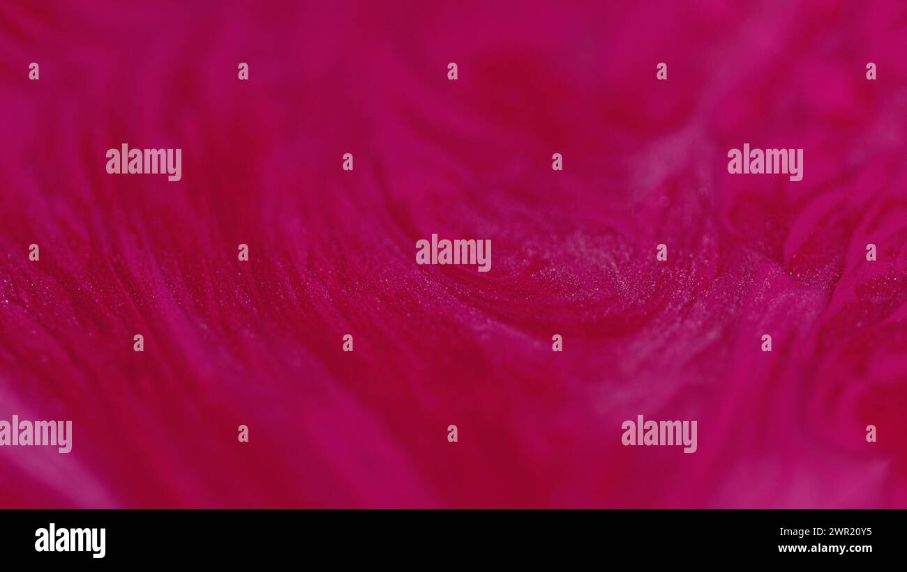 Glitter fluid sparkling mix wet ink texture pink Stock Photo - Alamy