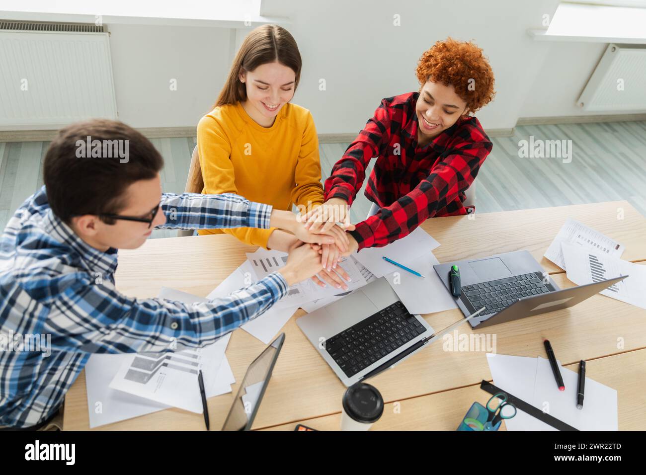 Stack of hands. Business startup teamwork unity concept. Top view of ...