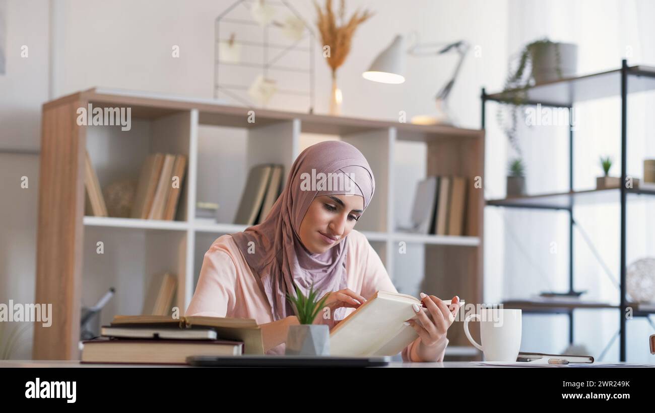 Reading student home education woman book desk Stock Photo - Alamy