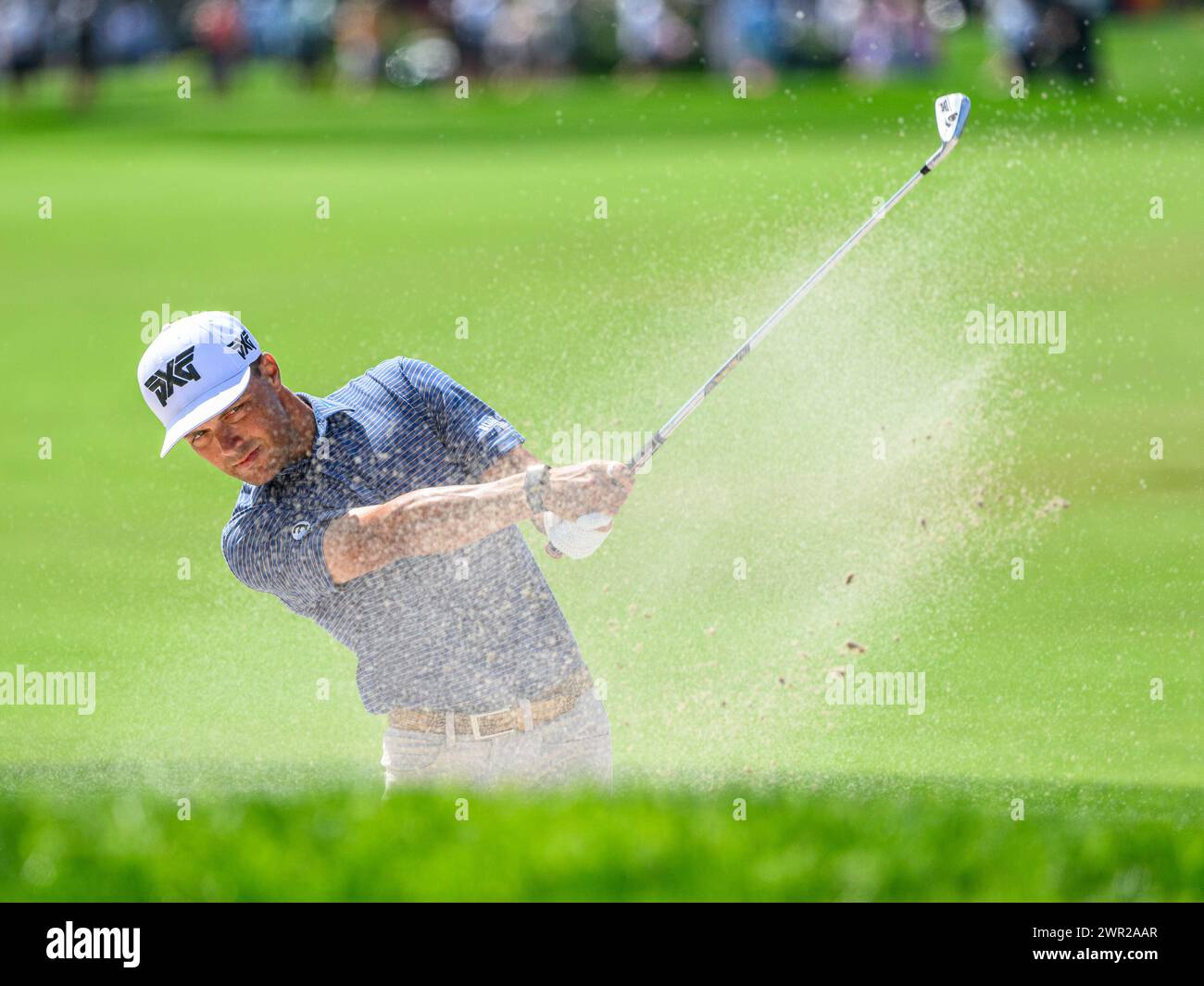 Orlando, FL, USA. 10th Mar, 2024. Eric Cole hits out of the fairway ...