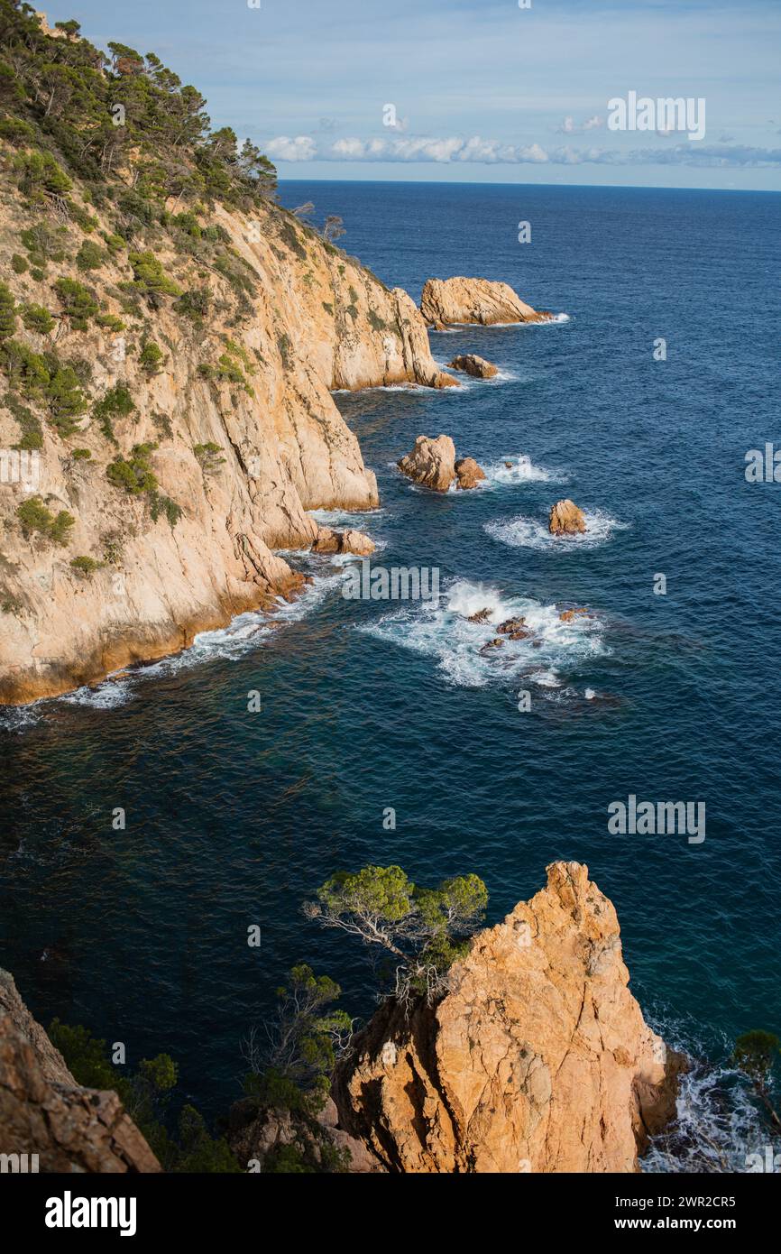 Rugged cliffs along Costa Brava near Tossa de Mar, Spain Stock Photo ...