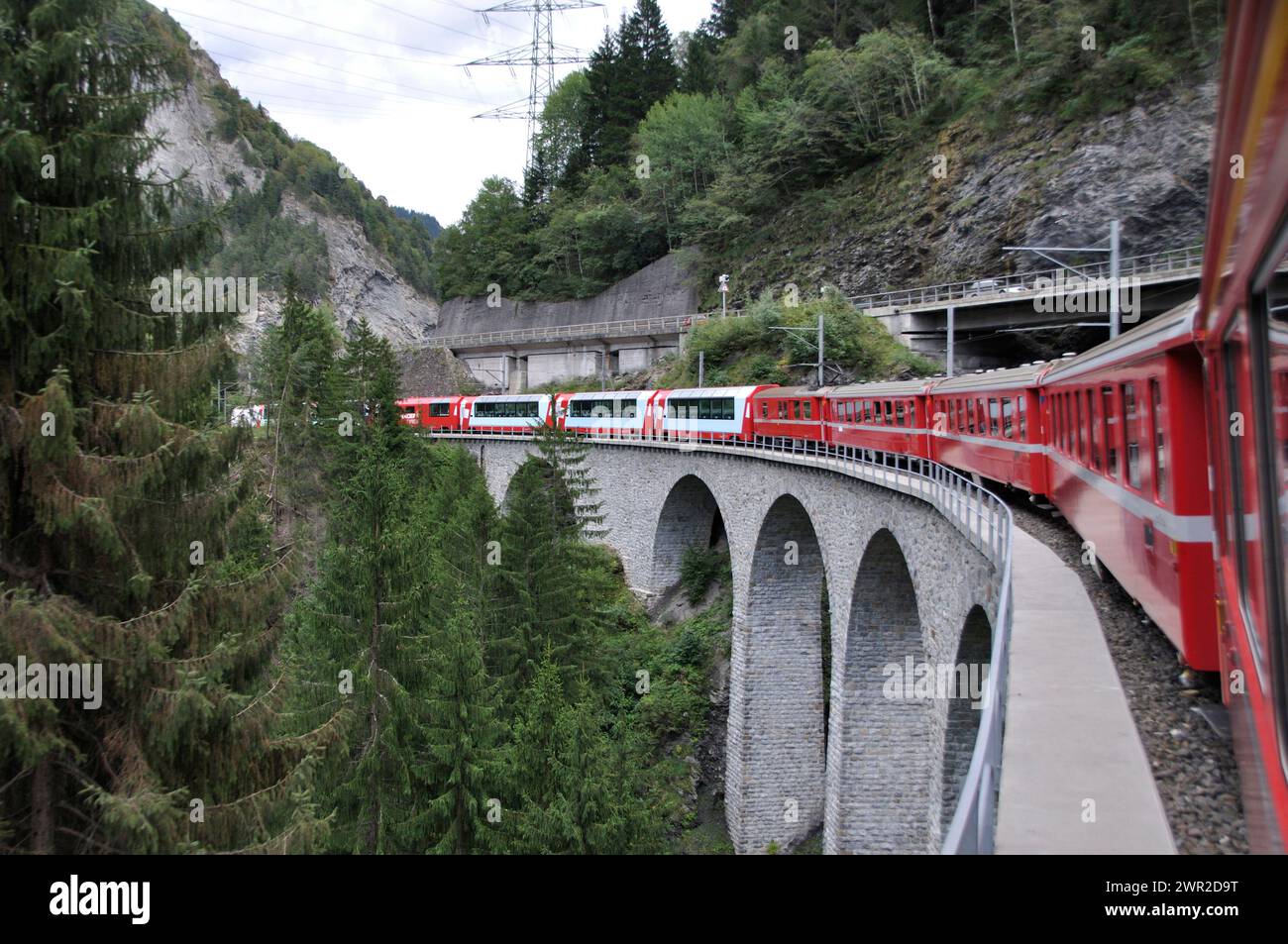 Crossing the swiss alps in the Glacier Express train, which travels ...