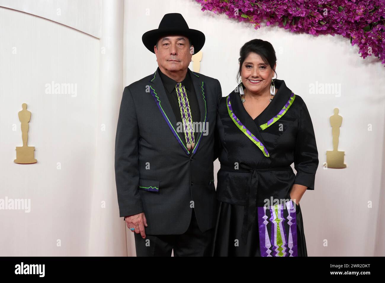 Scott George, left, and Taveah Ann George arrive at the Oscars on ...