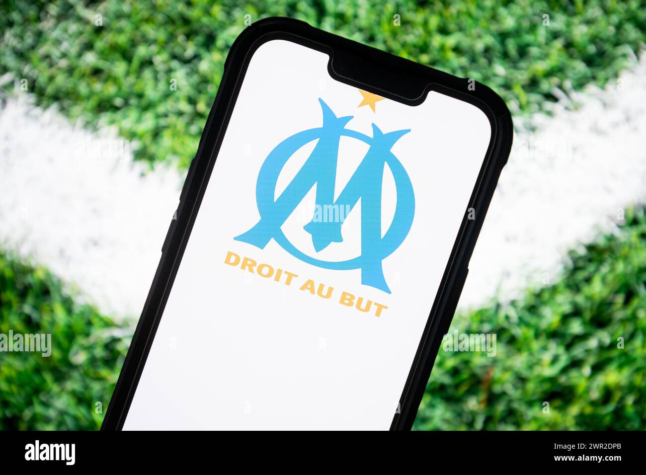 In this photo illustration, an Olympique Marseille football club logo seen displayed on a ...