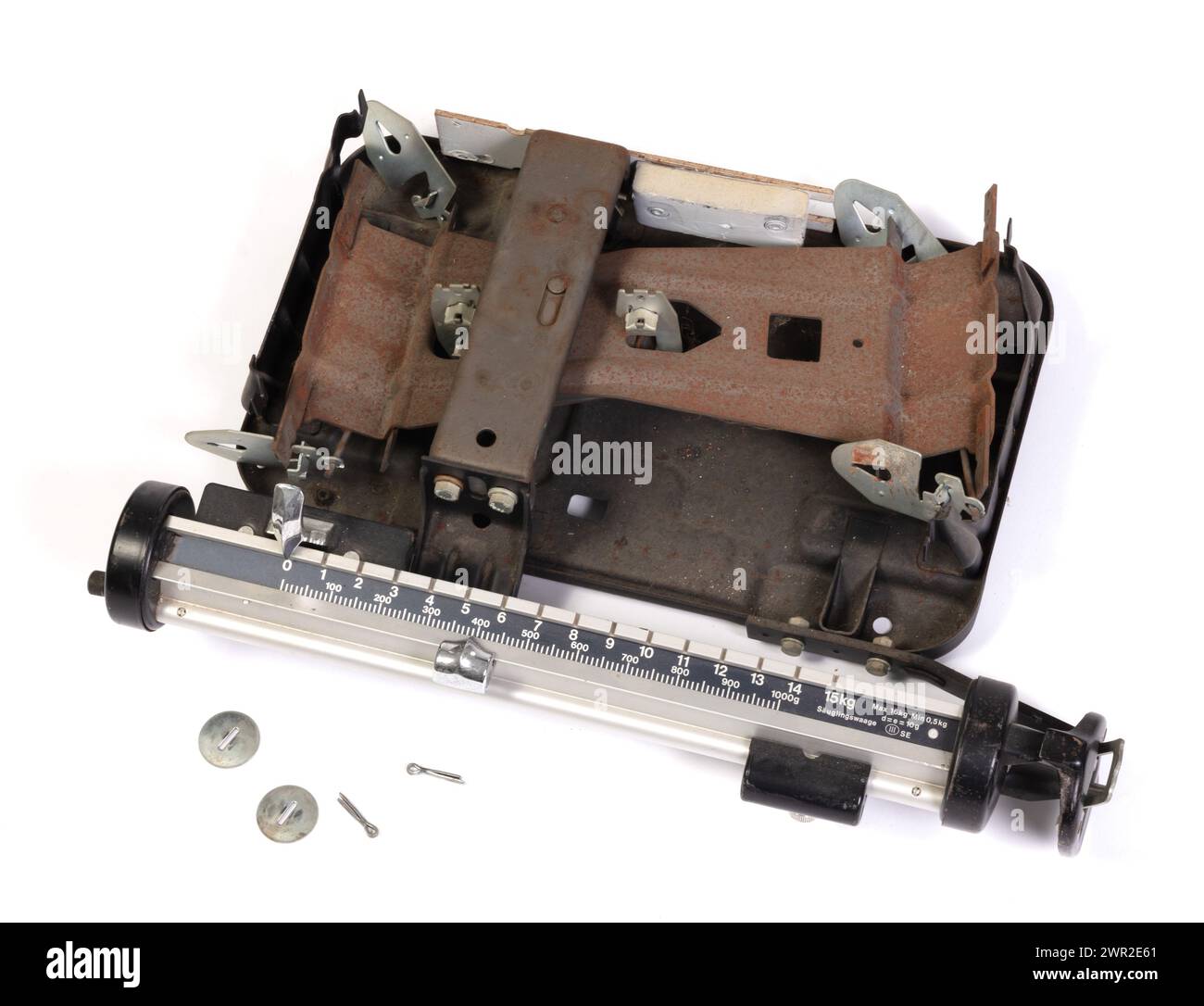 Part of broken baby weight scales, isolated on white Stock Photo - Alamy