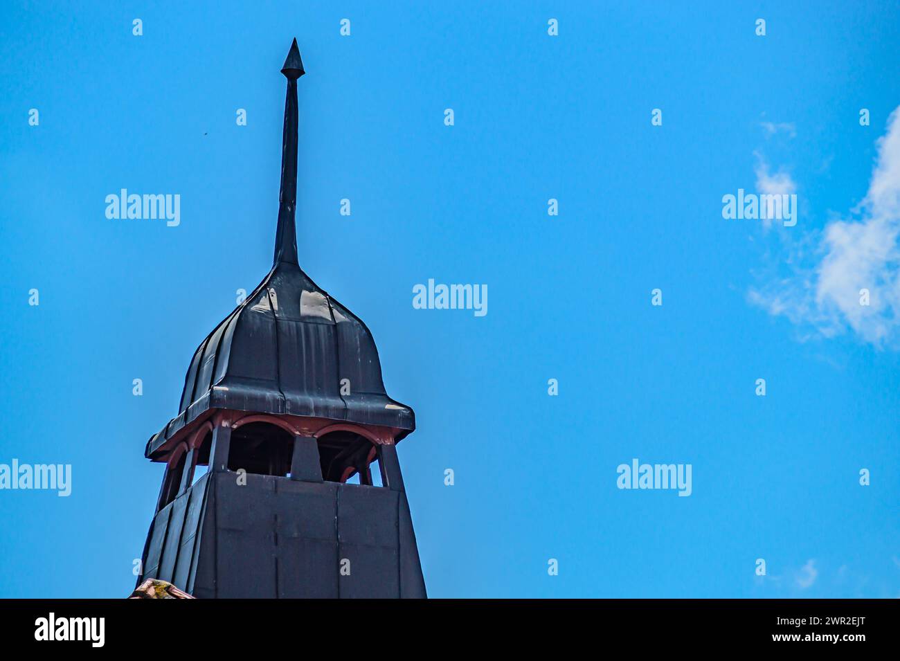 An ancient Gothic tower. A black tower with a tip, a place for archers ...