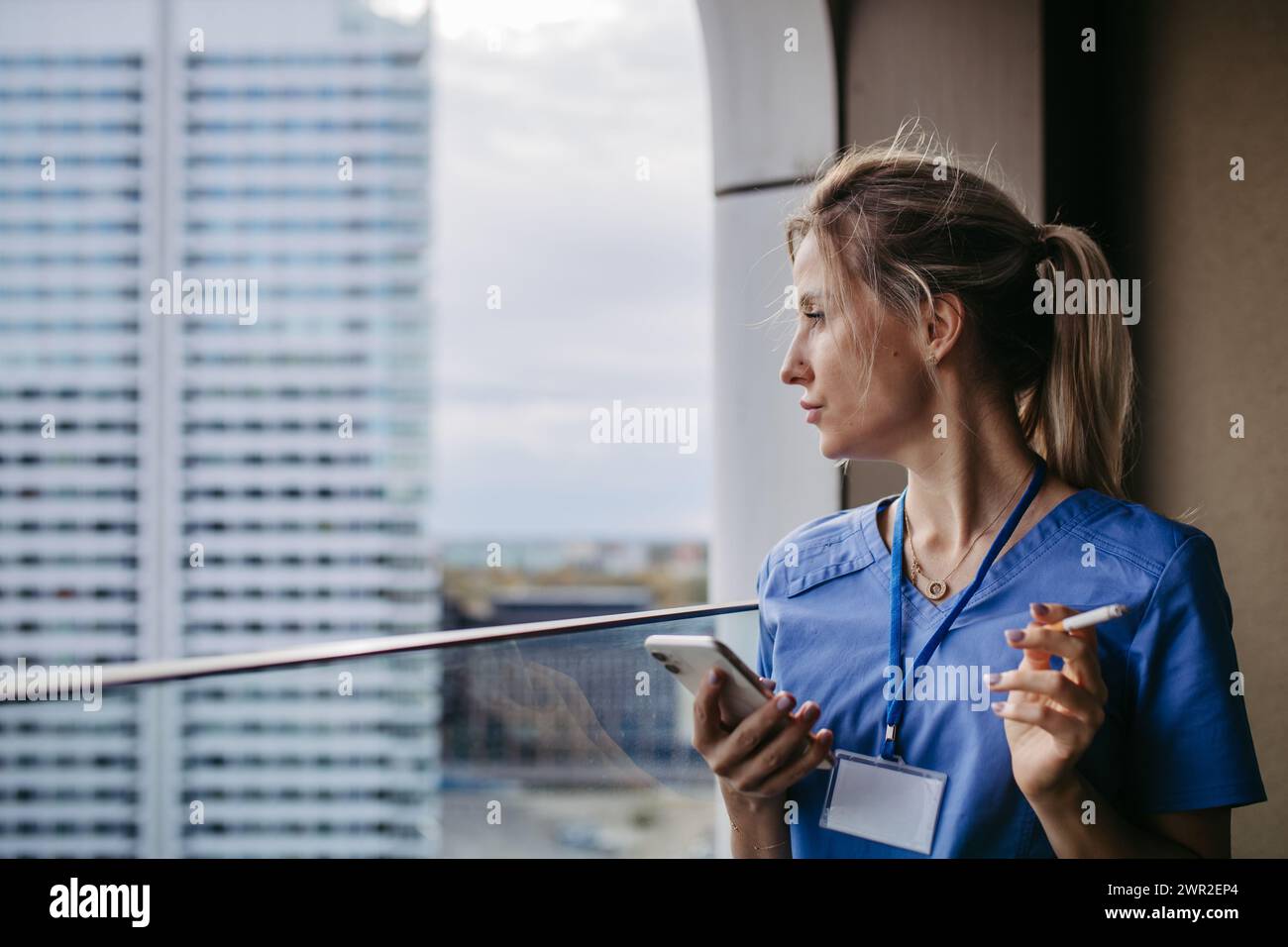 Nurse smoking cigarette break hi-res stock photography and images - Alamy
