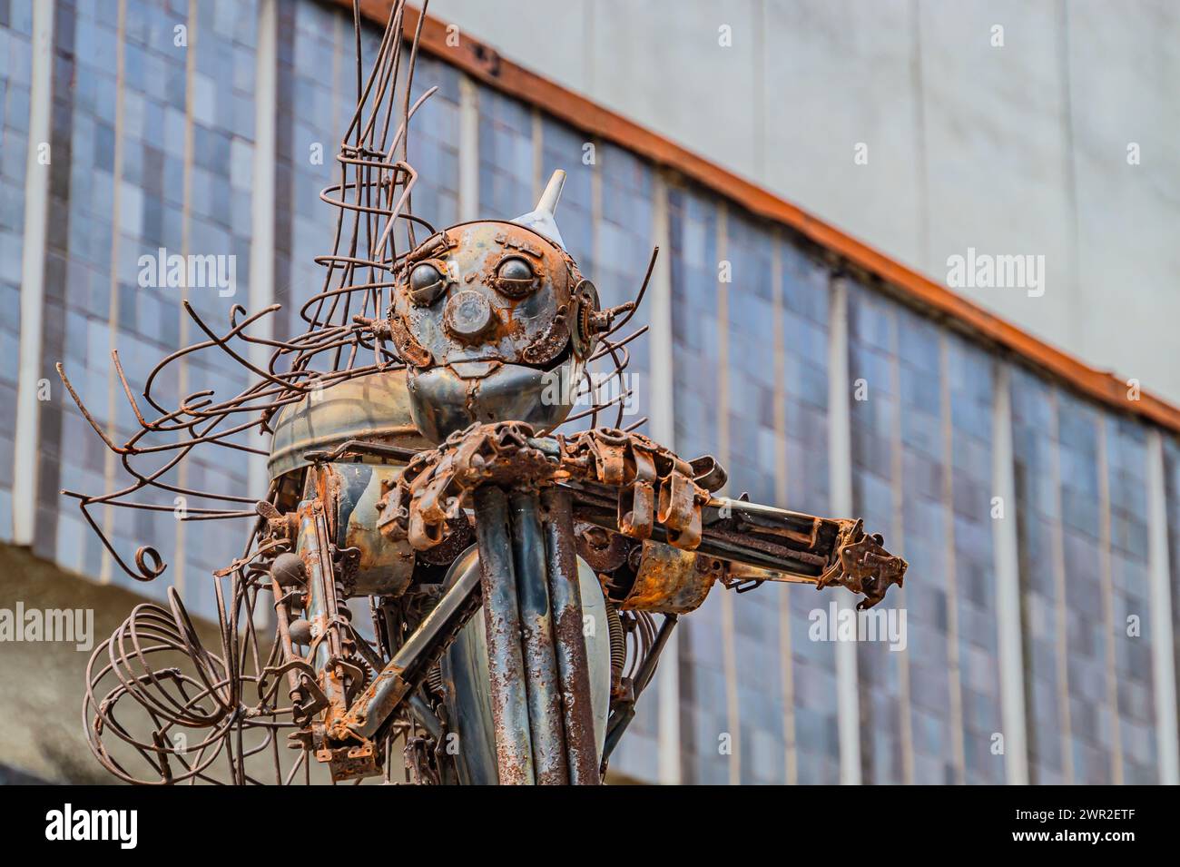 robot sculpture in the park, a robot resembling an iron lumberjack ...