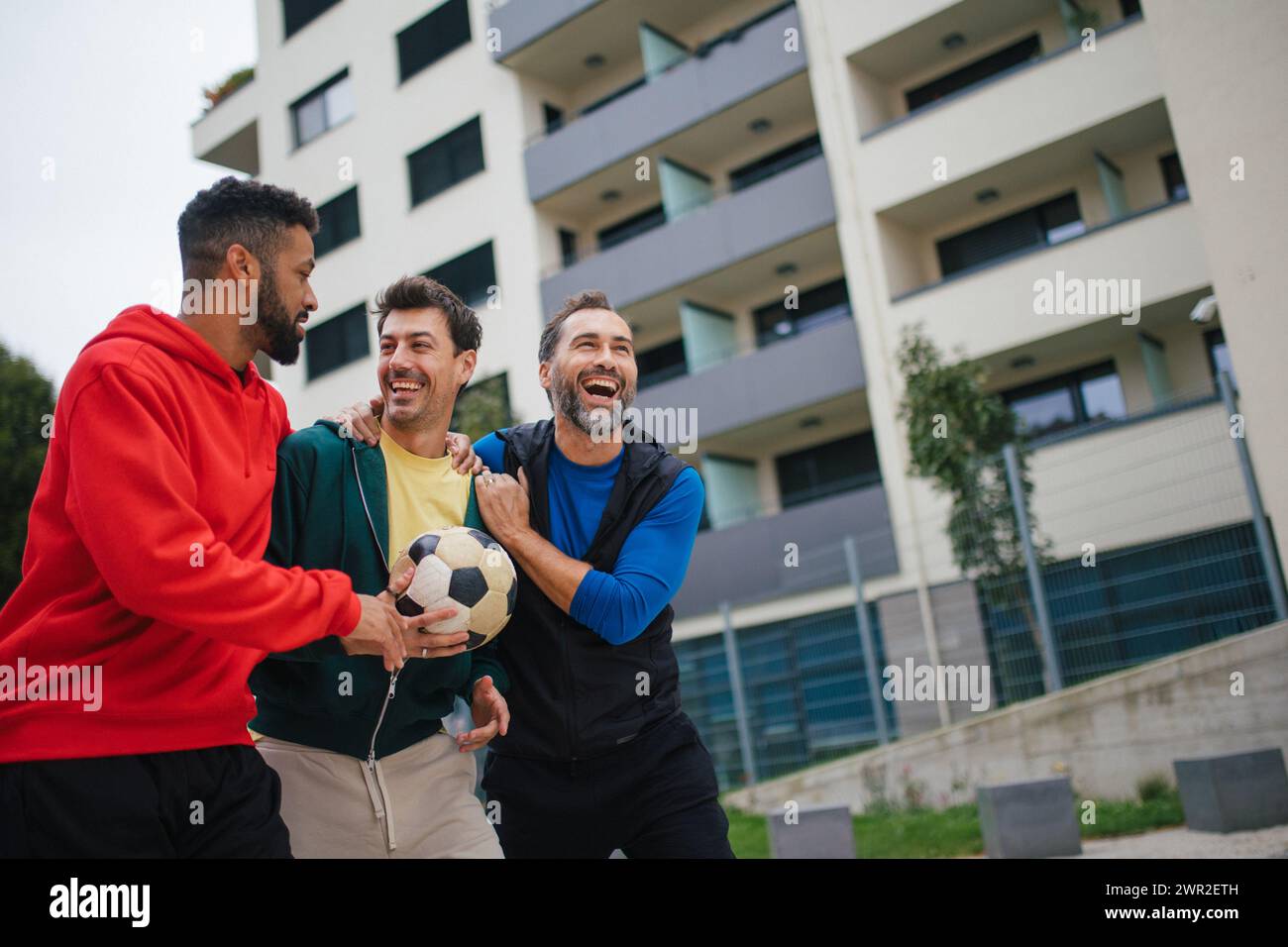 Best friends playing sport outdoors, having fun, competing. Playing ...