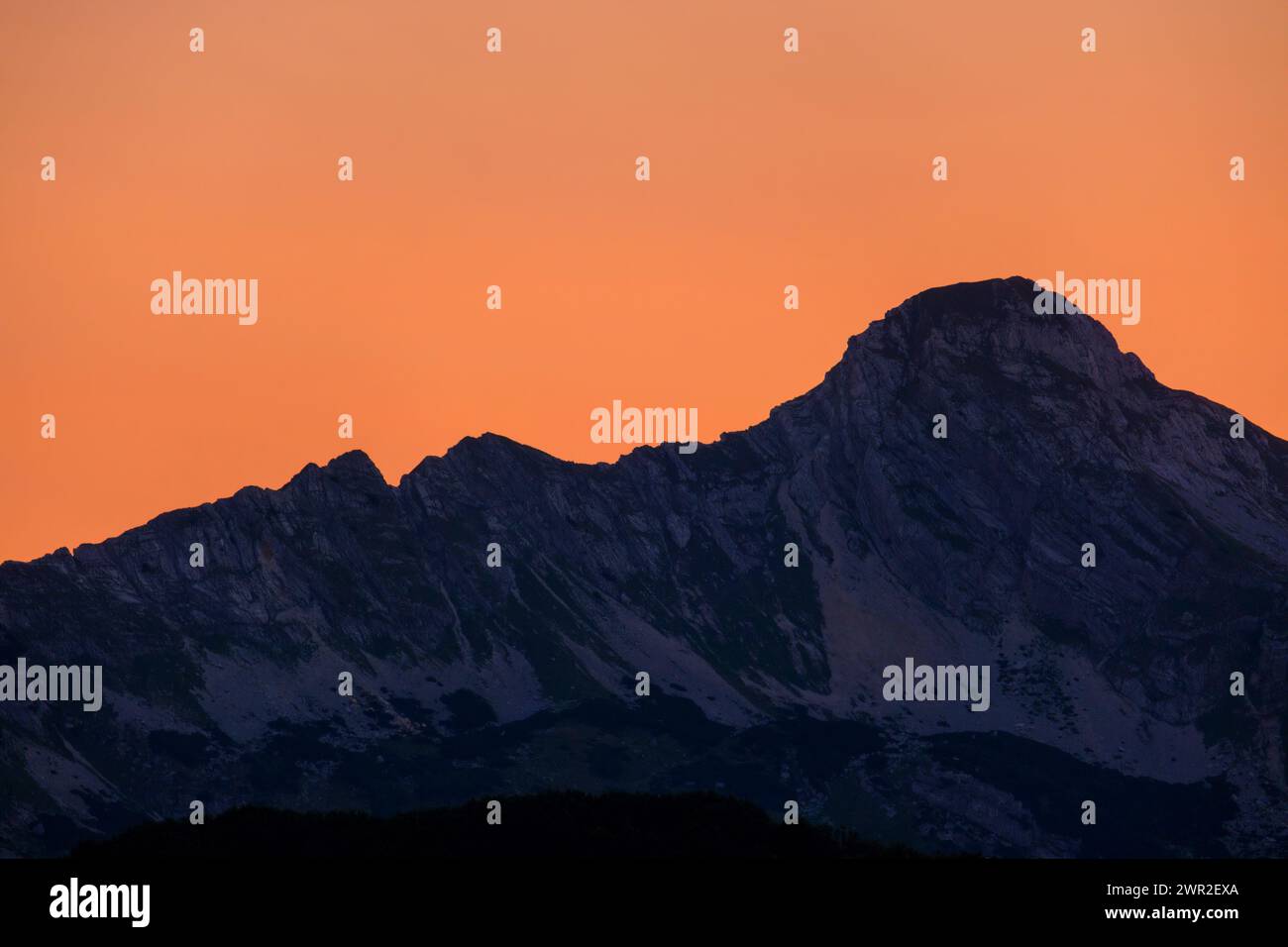 Orange Sky Mountain Peak Sunset Mac Wallpaper Style Stock Photo - Alamy